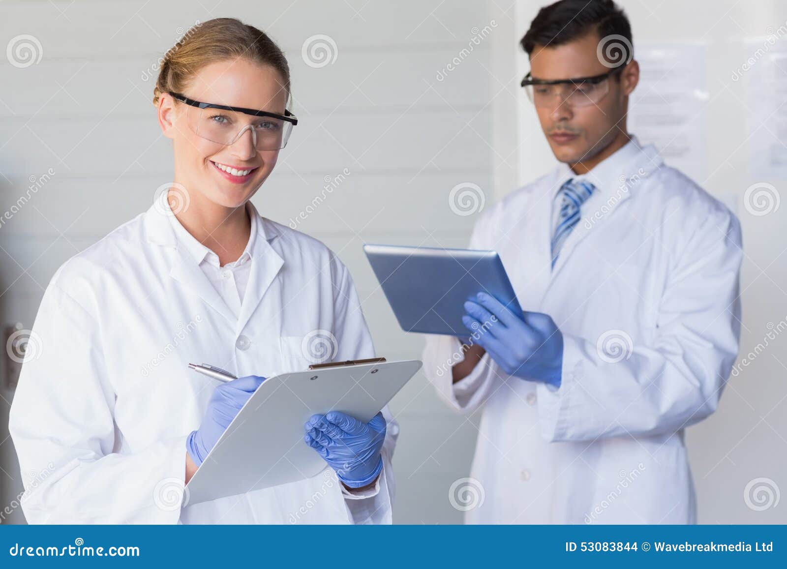 Scientists taking notes stock photo. Image of male, attentively - 53083844