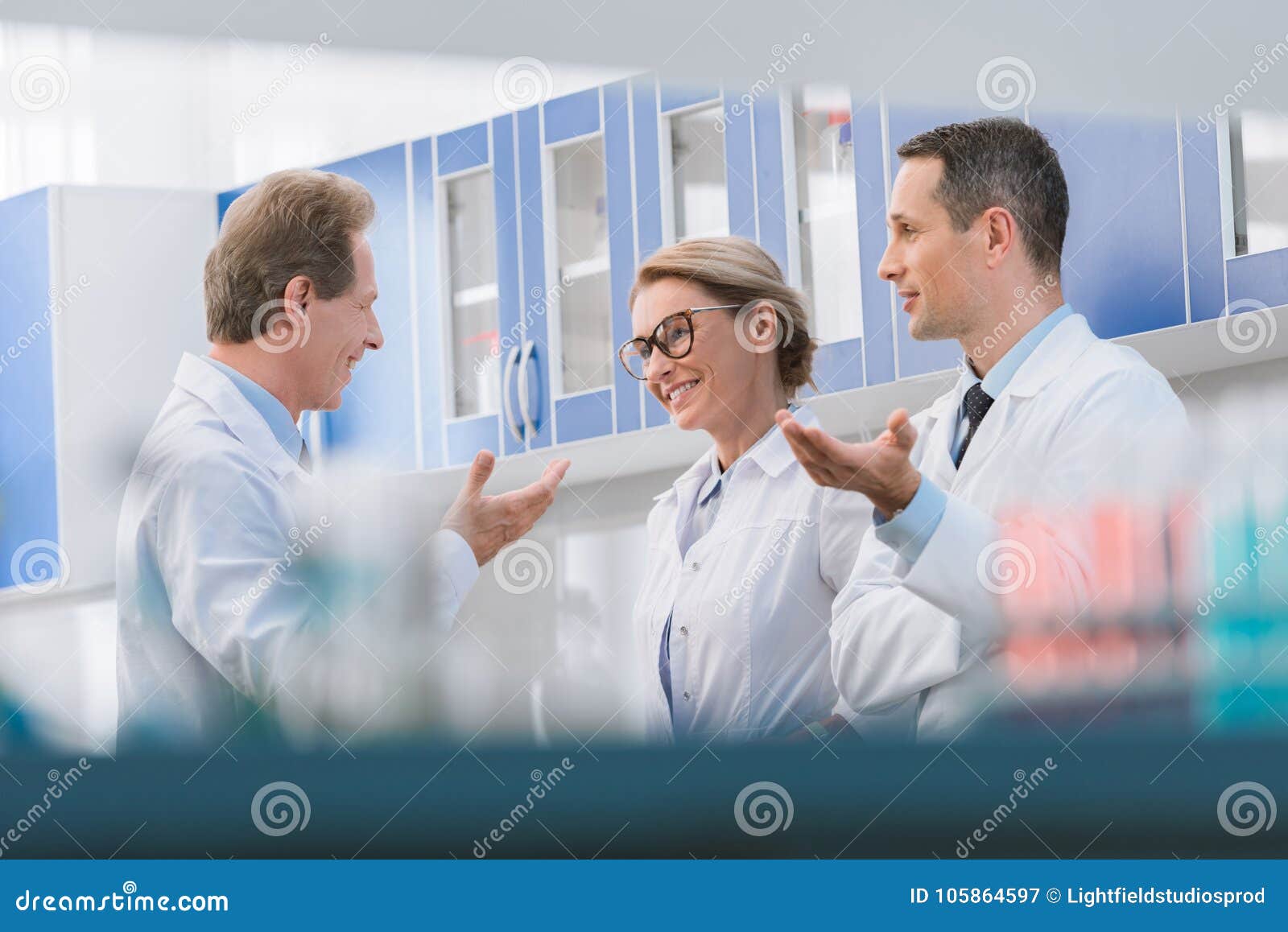Scientists Talking in Laboratory Stock Image - Image of adults ...