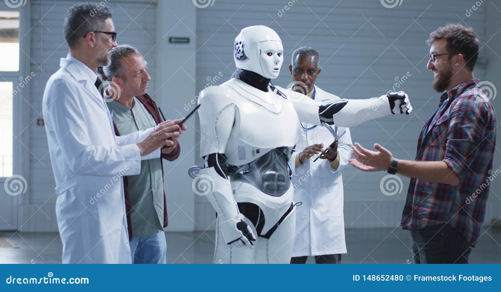 Scientists Testing a Humanoid Robots Hand Movement Stock Photo - Image ...