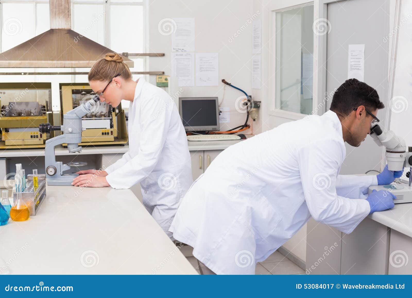 Scientists Using Microscope Stock Image - Image of indoors, caucasian ...