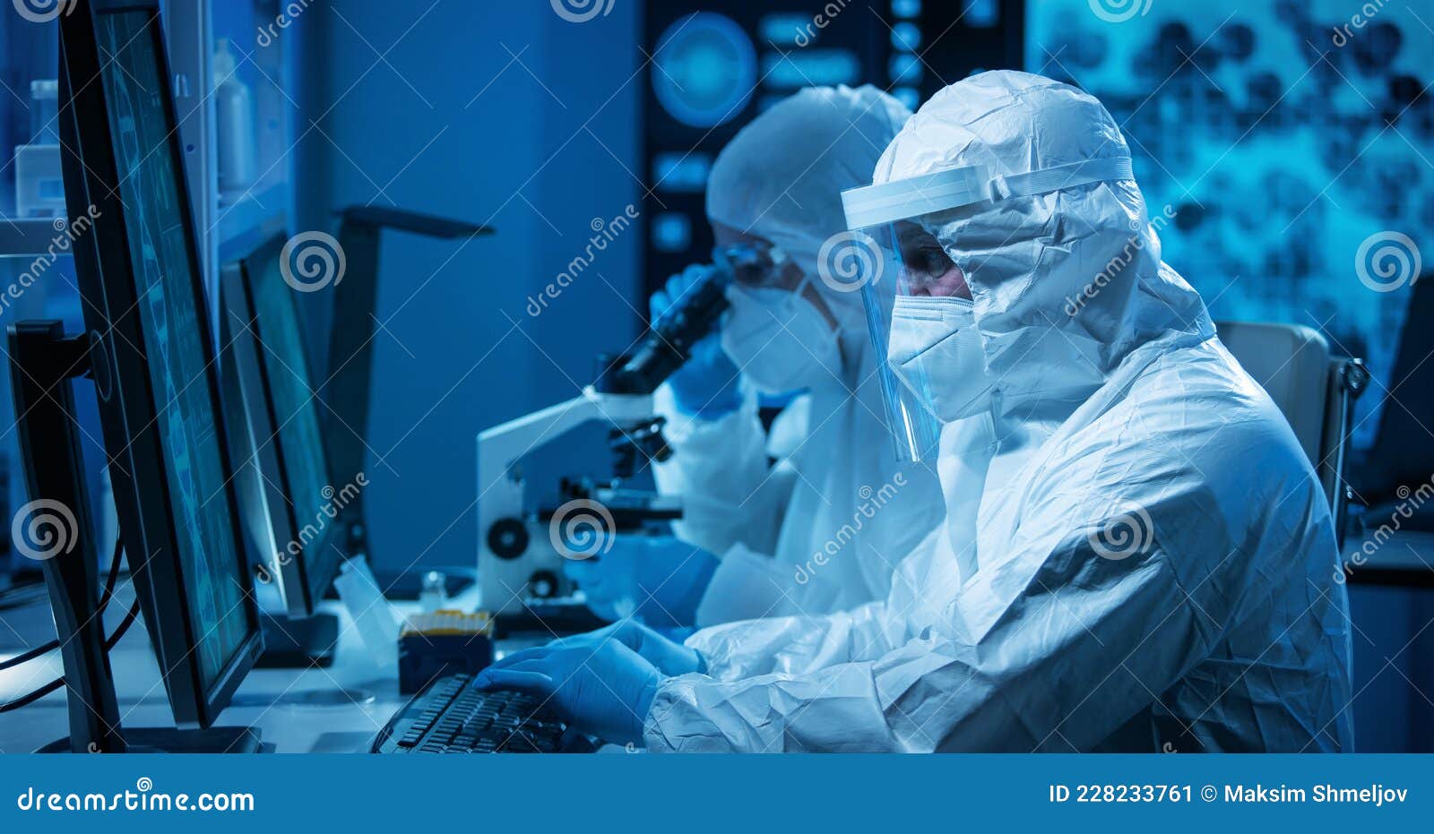 Scientists Work in a Modern Scientific Lab Using Laboratory Equipment ...