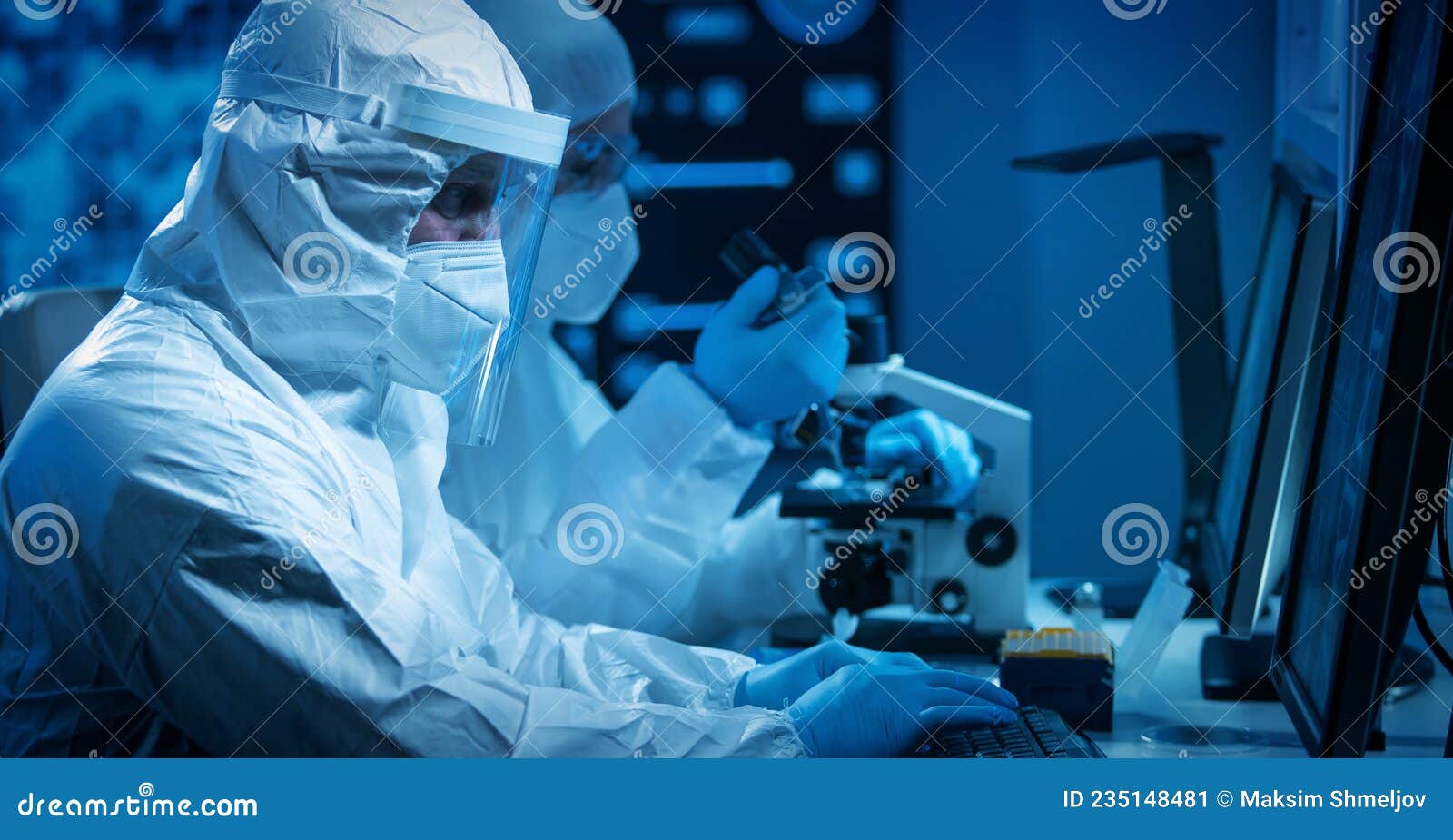 Scientists Work in a Modern Scientific Lab Using Laboratory Equipment ...