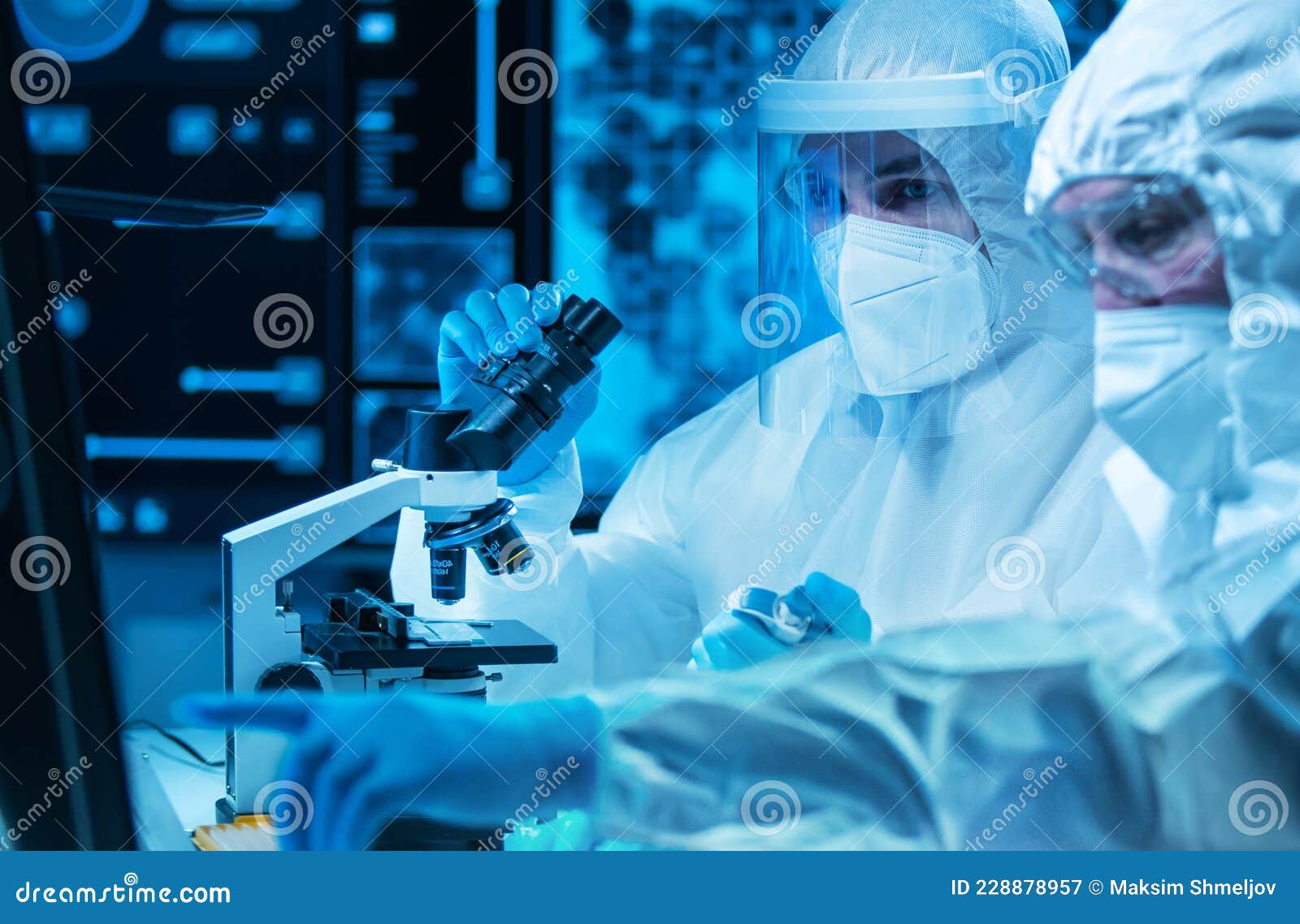 Scientists Work in a Modern Scientific Lab Using Laboratory Equipment ...