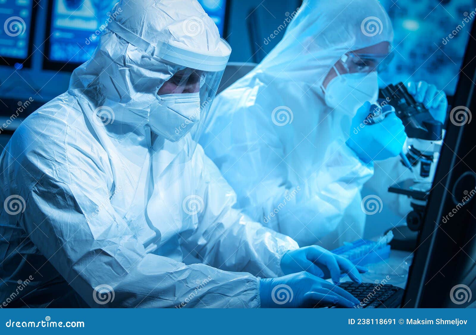 Scientists Work in a Modern Scientific Lab Using Laboratory Equipment ...
