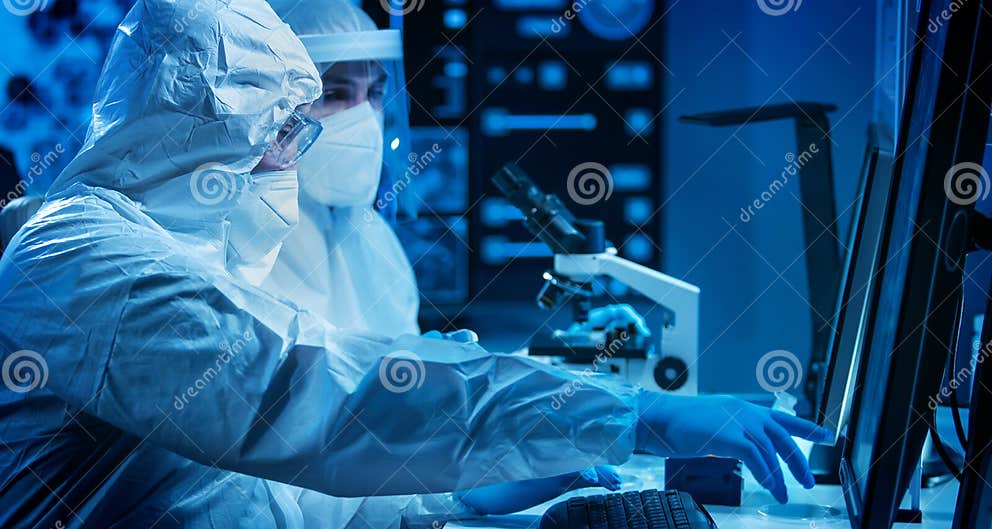 Scientists Work in a Modern Scientific Lab Using Laboratory Equipment ...