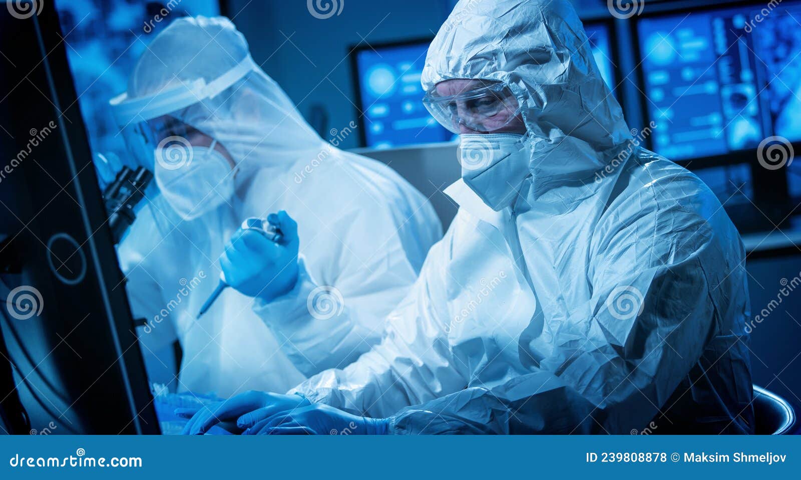 Scientists Work in a Modern Scientific Lab Using Laboratory Equipment ...