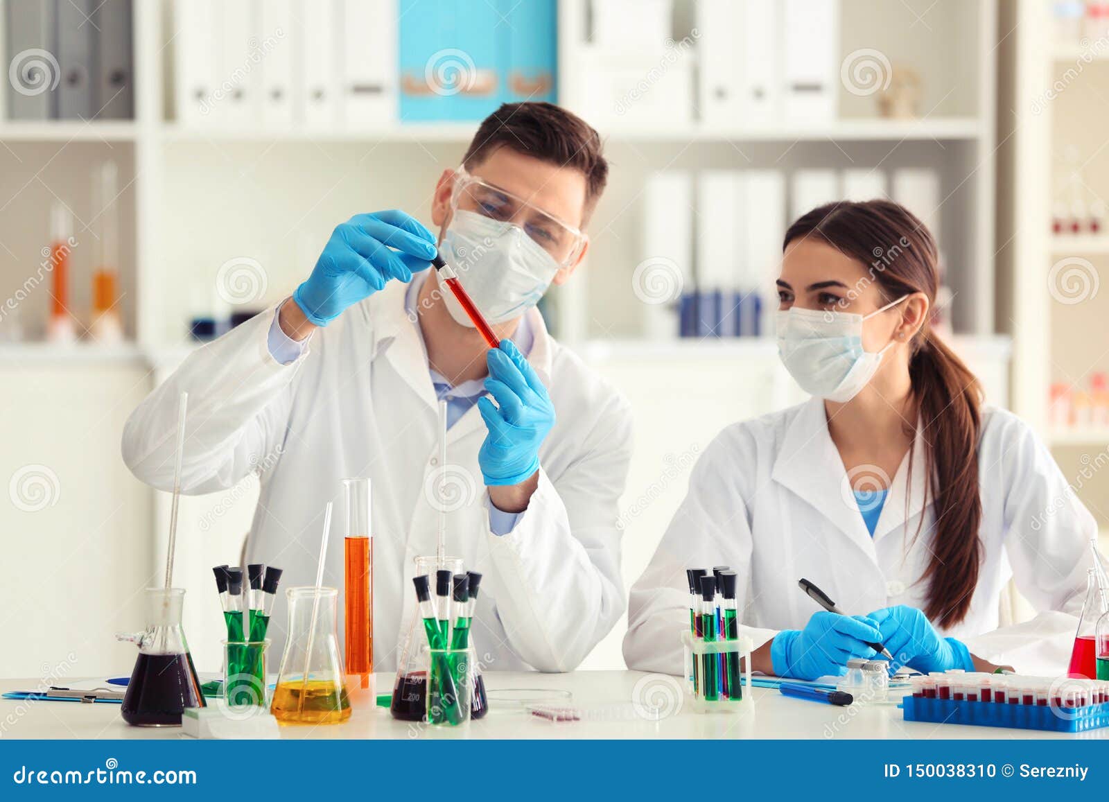 Scientists Working in Laboratory Stock Photo - Image of mask ...