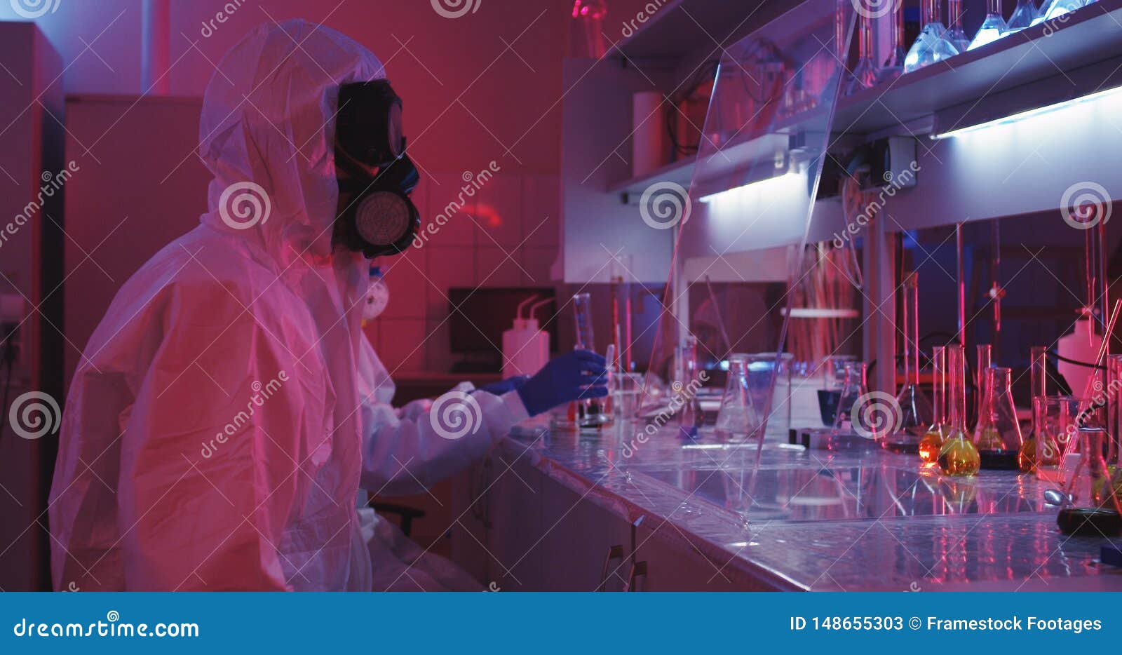 Scientists Working in Laboratory in Red Light Stock Image - Image of ...