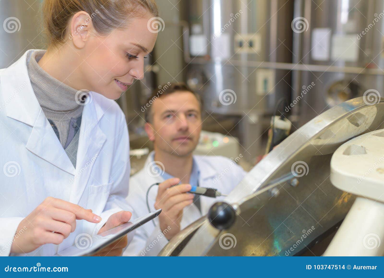 Scientists Working with Large Vat in Lab Stock Photo - Image of energy ...