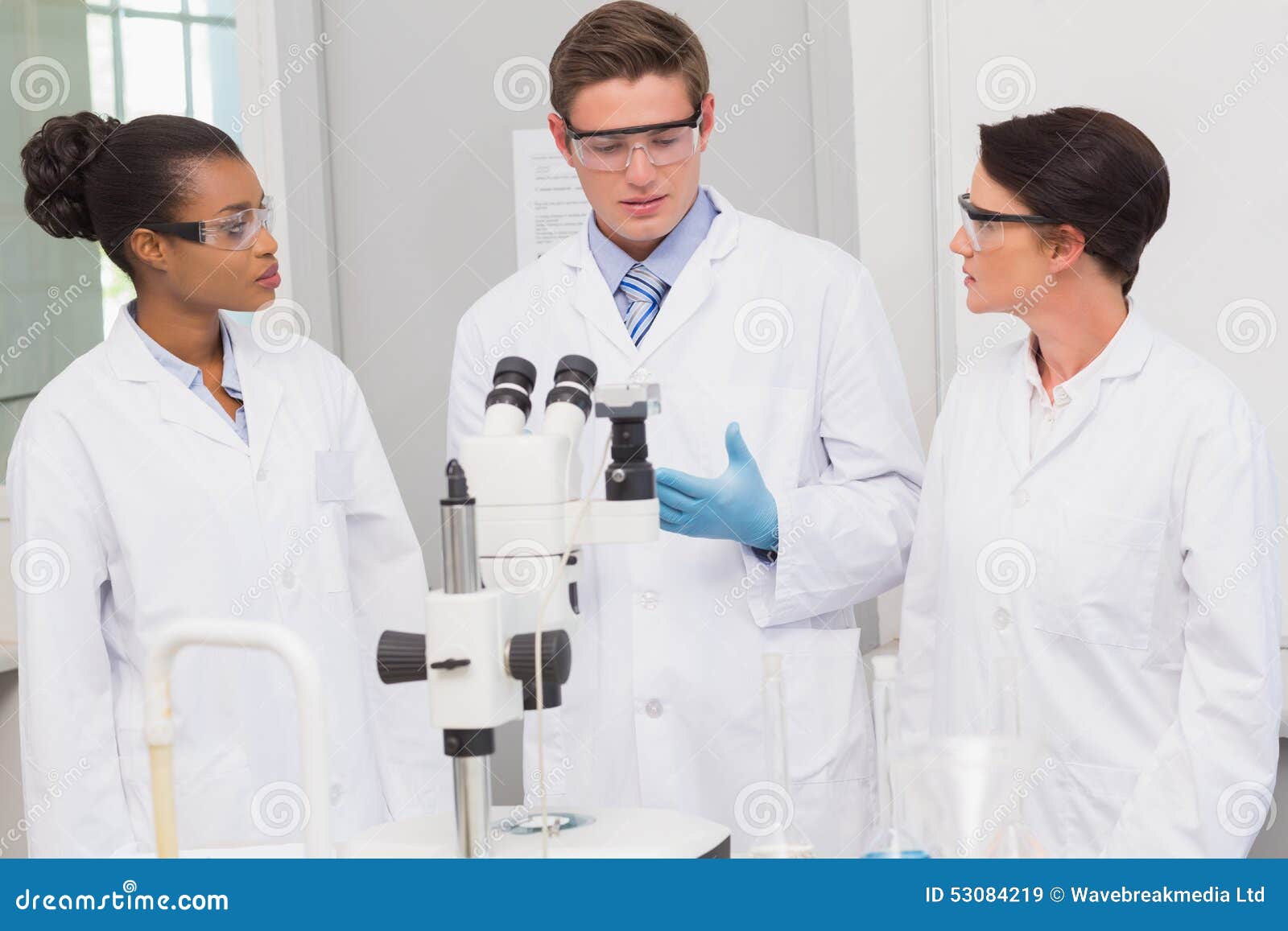 Scientists Working Together Stock Image - Image of male, microscope ...