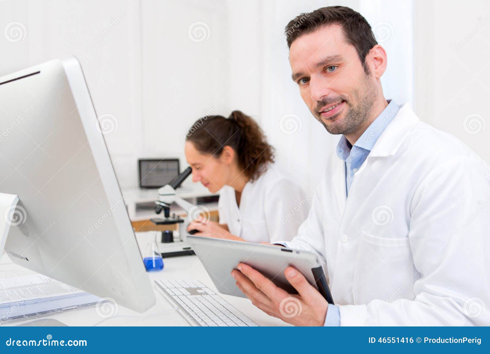 Scientists Working Together in a Laboratory Stock Photo - Image of ...