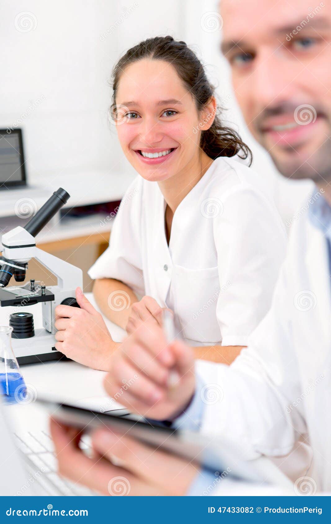 Scientists Working Together in a Laboratory Stock Photo - Image of ...