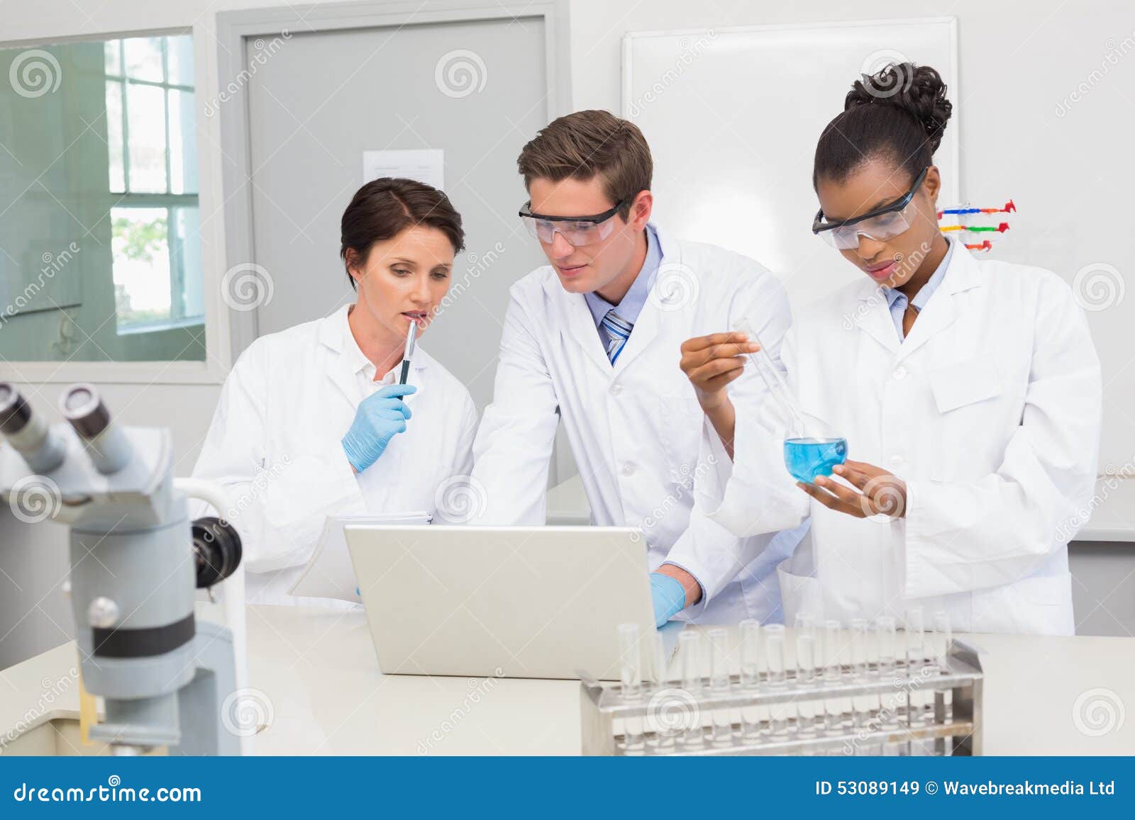 Scientists Working Together on Precipitate Tests Stock Image - Image of ...