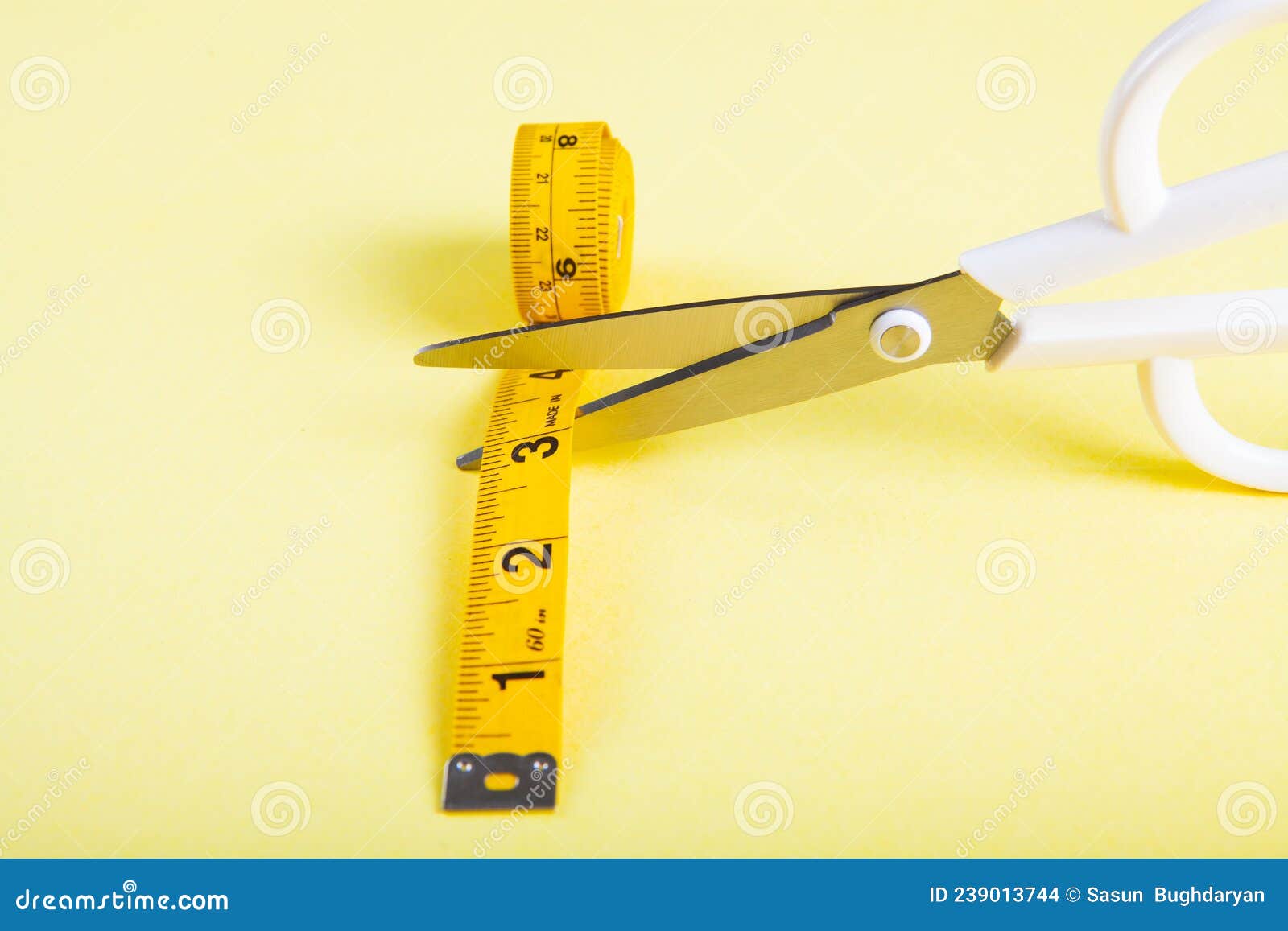 Scissor Cuts Measuring Tape Stock Photo - Image of tape, scissor: 239013744
