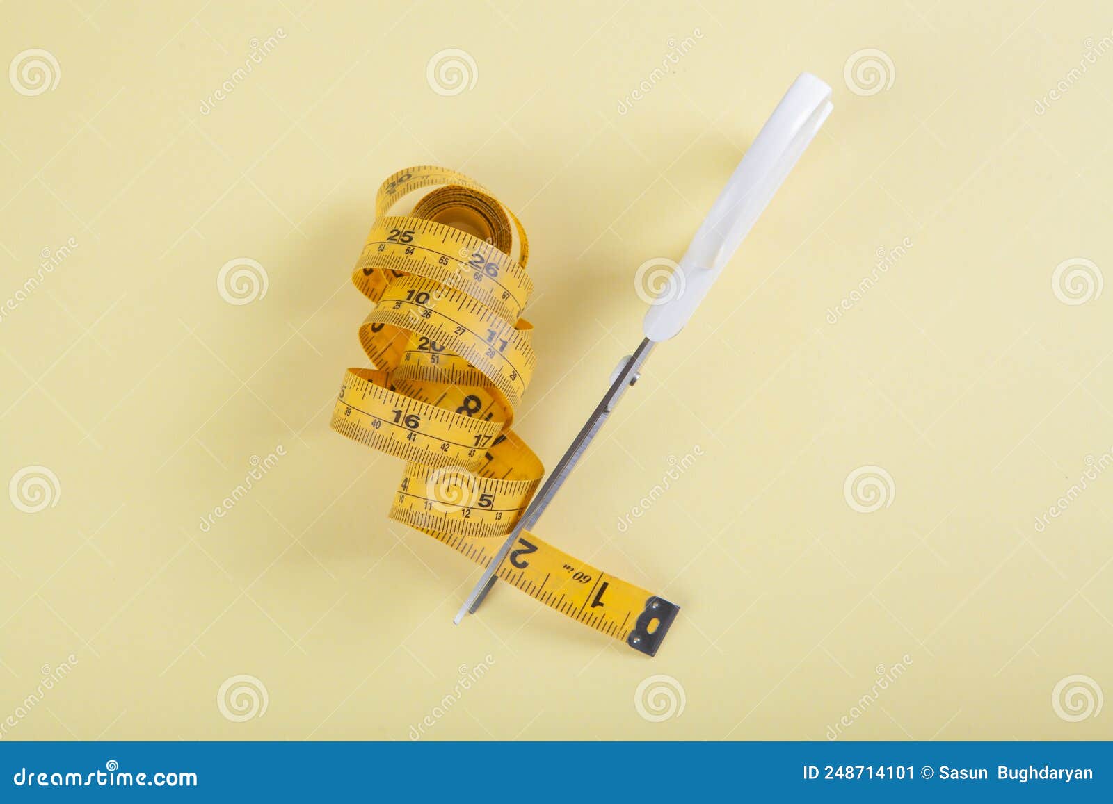 Scissor Cuts Measuring Tape on Yellow Background Stock Image - Image of ...