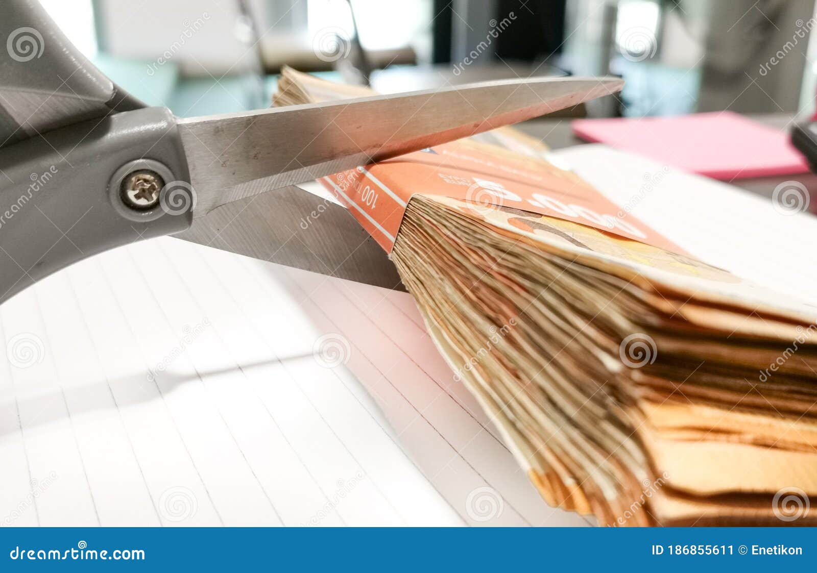 Scissor cutting money stock image. Image of wood, floor - 186855611