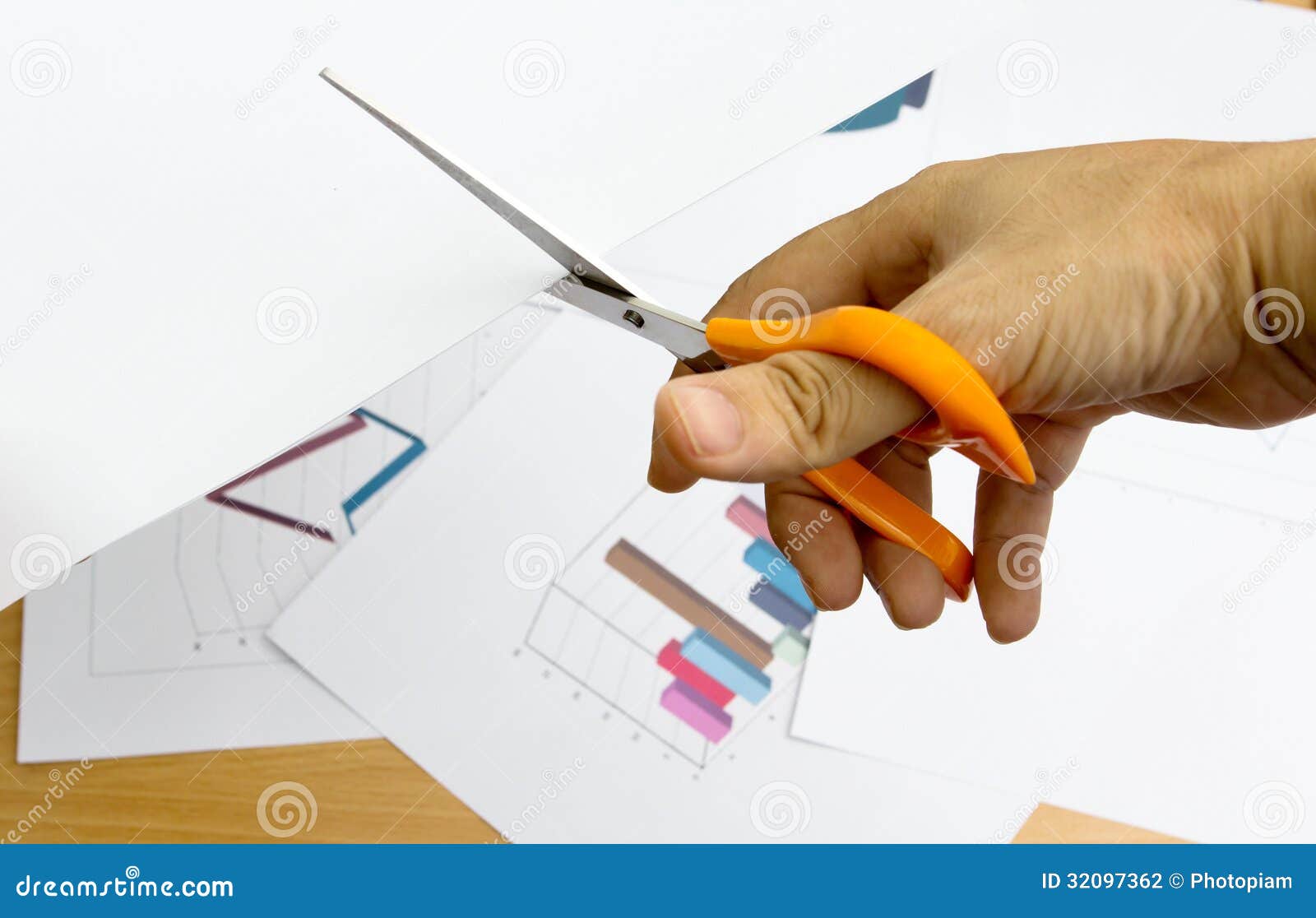 Scissors in the Act of Paper for Do Graph and Chart for Report Work ...