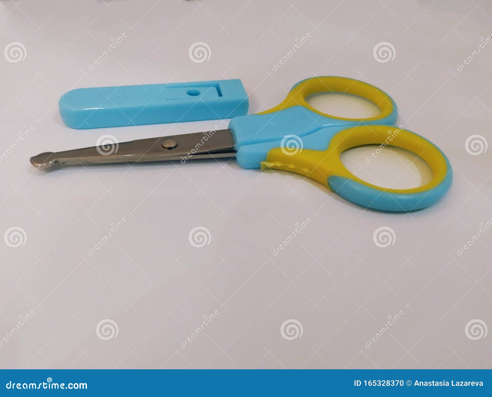 Scissors for Children with a Rounded End Stock Photo - Image of hand ...