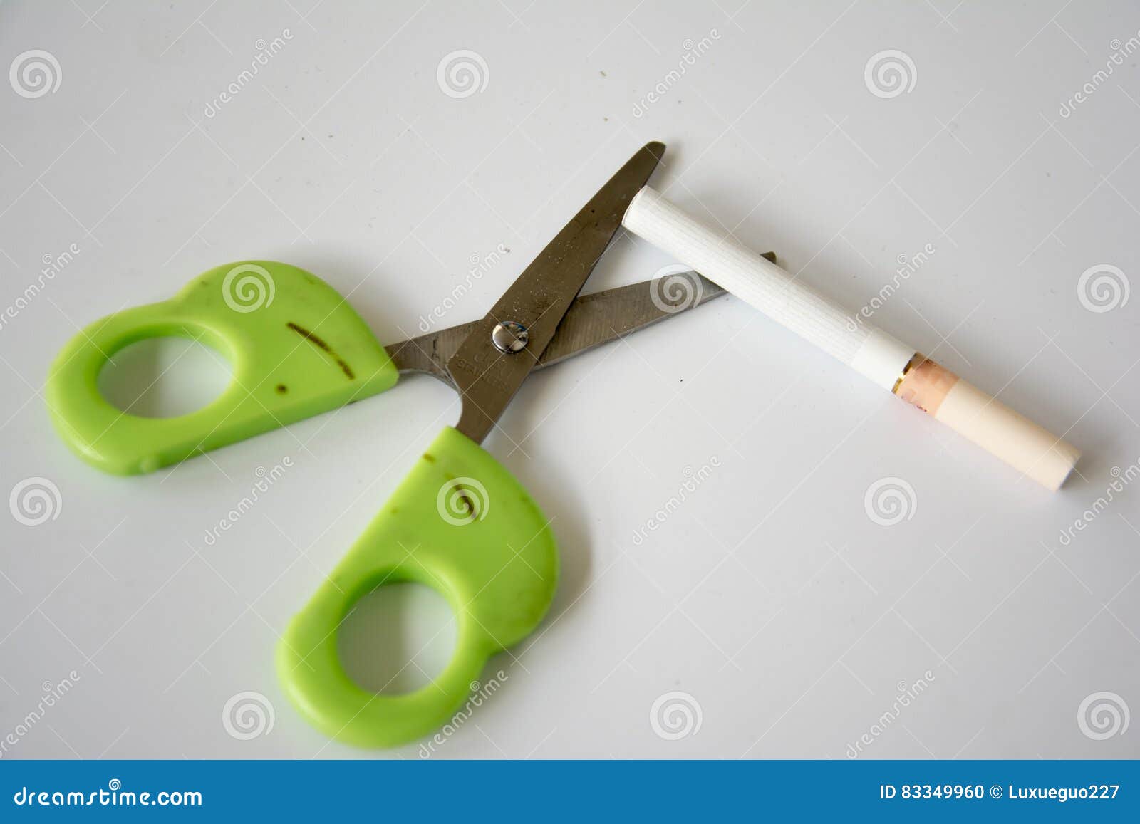 Scissors and cigarettes stock photo. Image of green, tools - 83349960