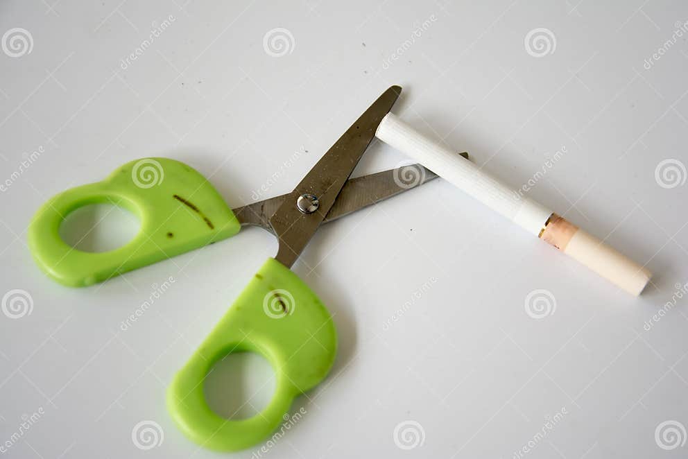 Scissors and cigarettes stock photo. Image of green, tools - 83349960