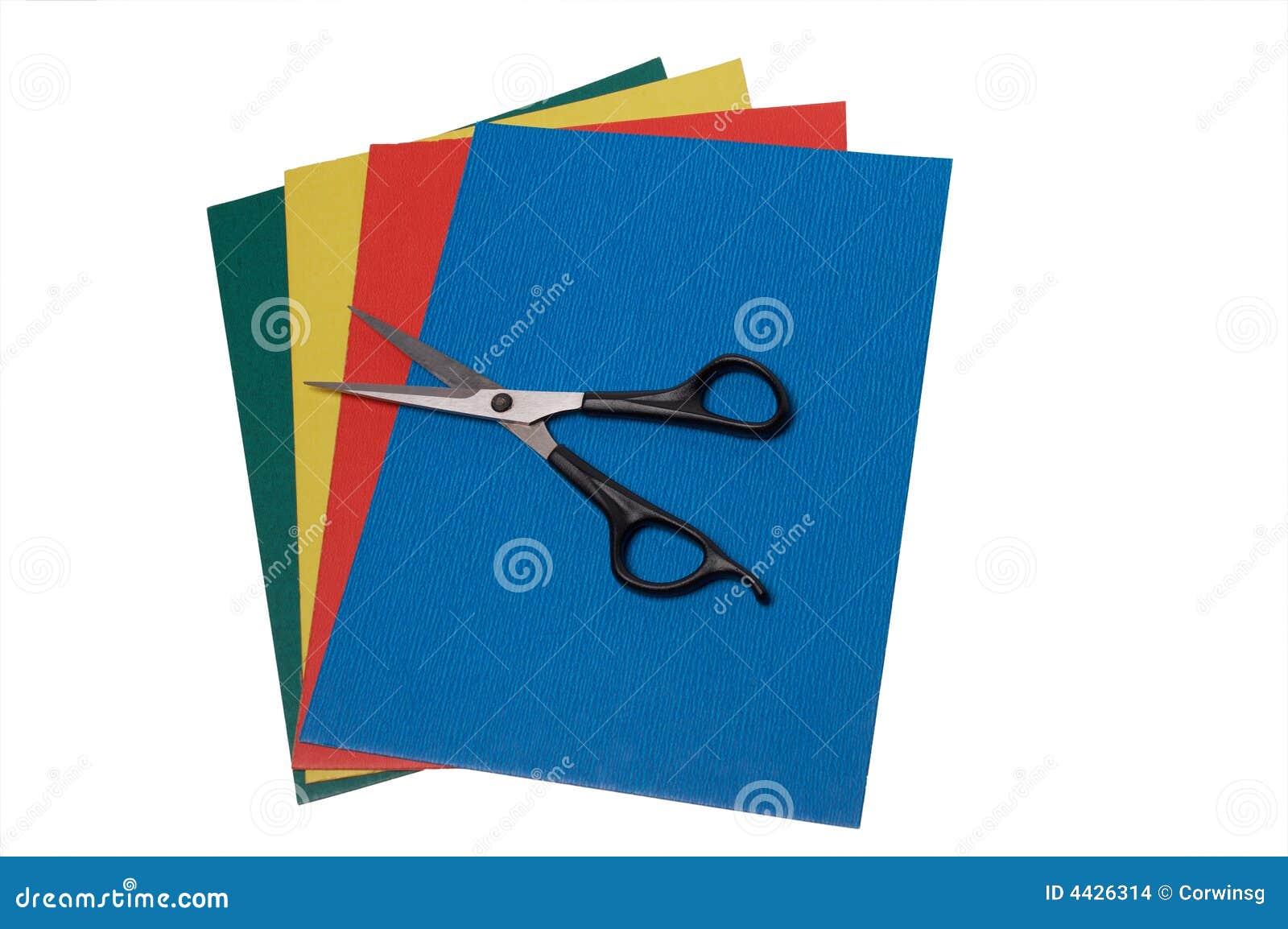 Scissors on colored paper stock photo. Image of paper - 4426314