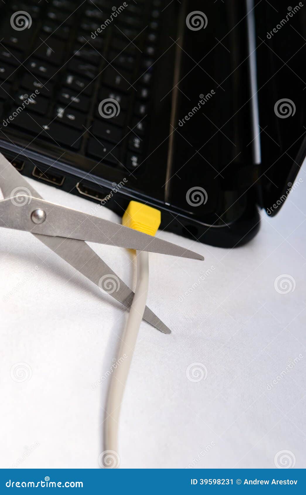 Scissors Cut the Cable Connected To a Laptop Stock Image - Image of ...
