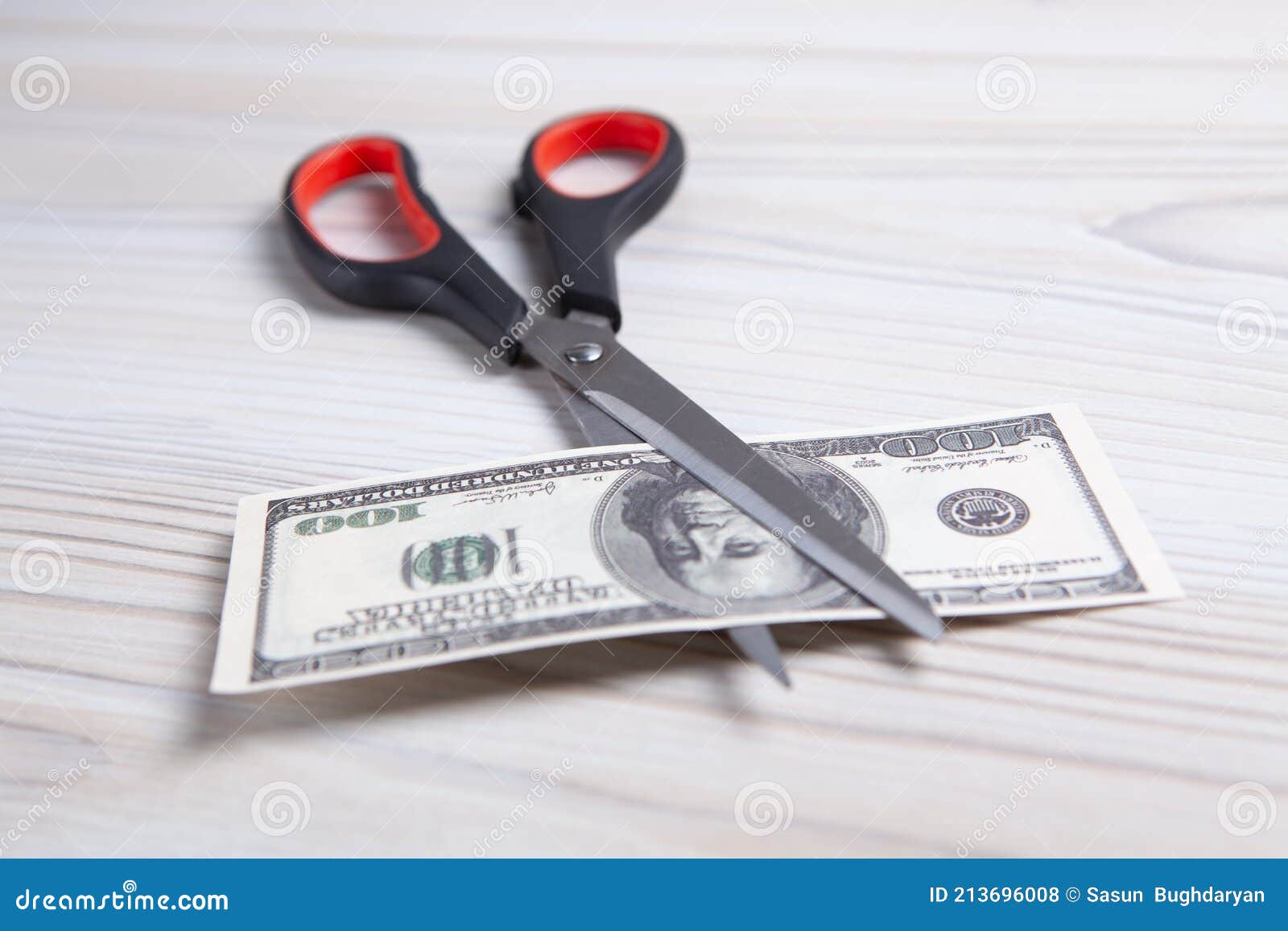 Scissors Cut a Dollar Bill in Half Stock Photo - Image of concept ...