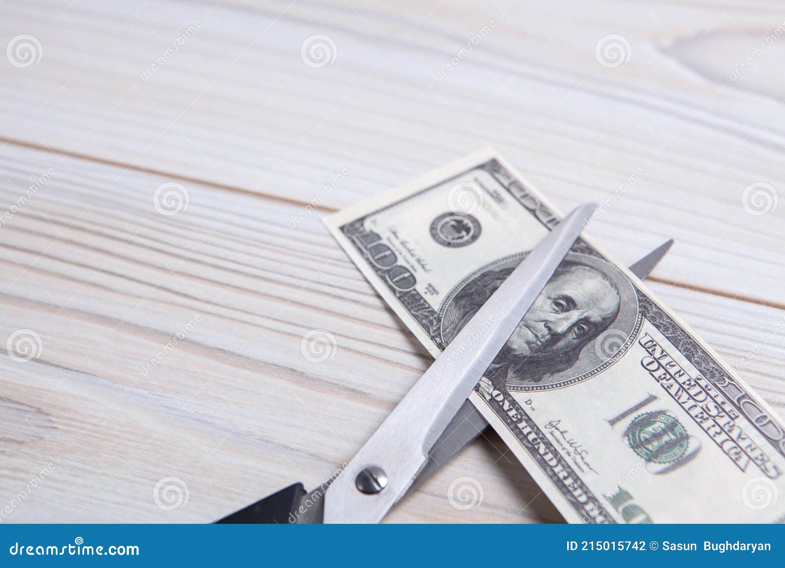 Scissors Cut a Dollar Bill in Half Stock Photo - Image of stack, income ...