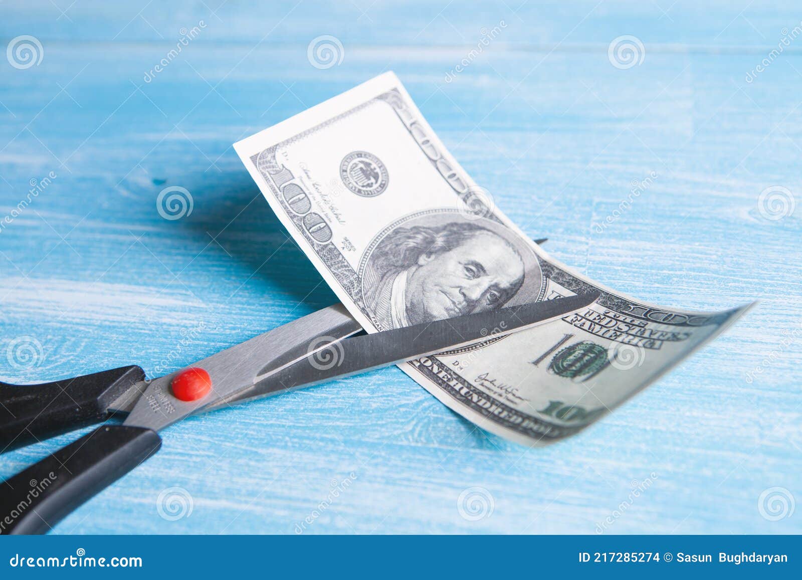 Scissors Cut a Dollar Bill in Half Stock Photo - Image of cost, price ...