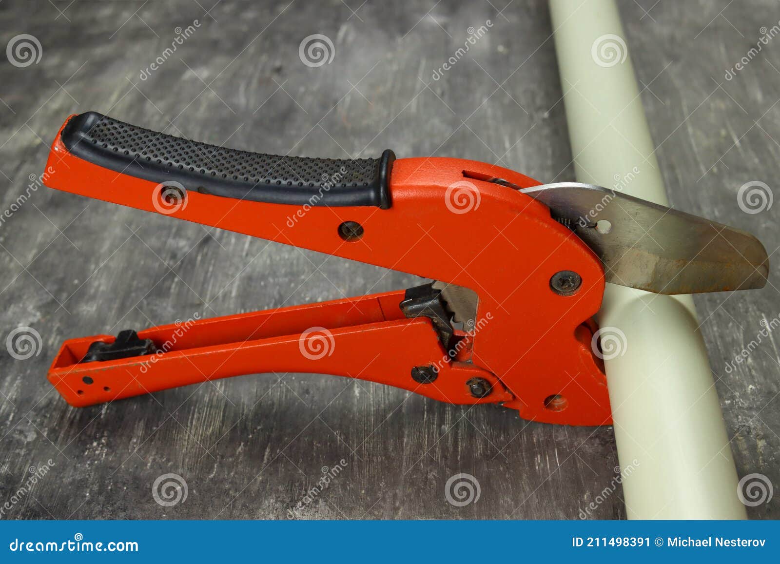 Scissors Cut a Plastic Water Pipe Stock Image - Image of pipe, heating ...