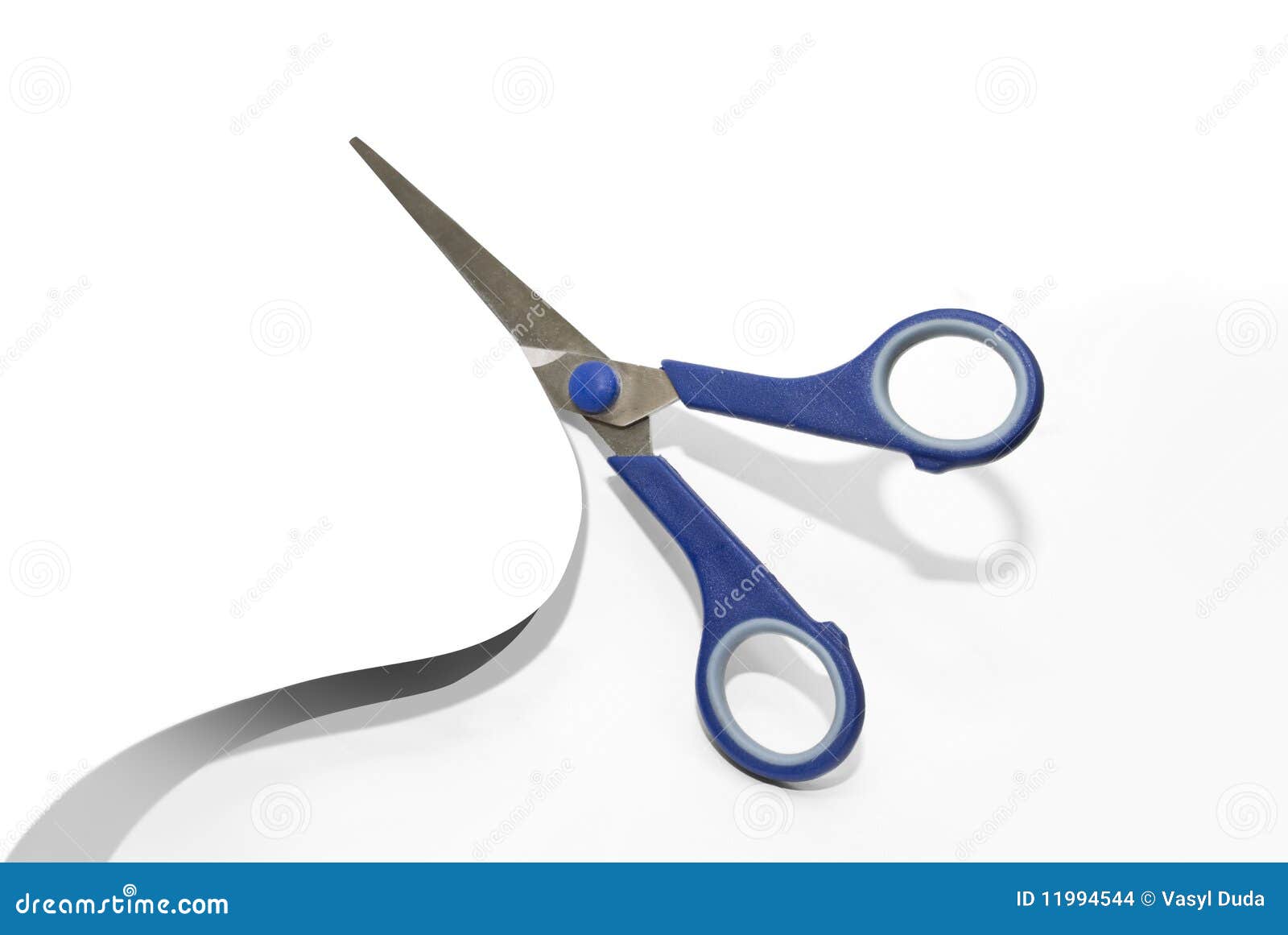 Scissors cutting a paper stock photo. Image of framework - 11994544