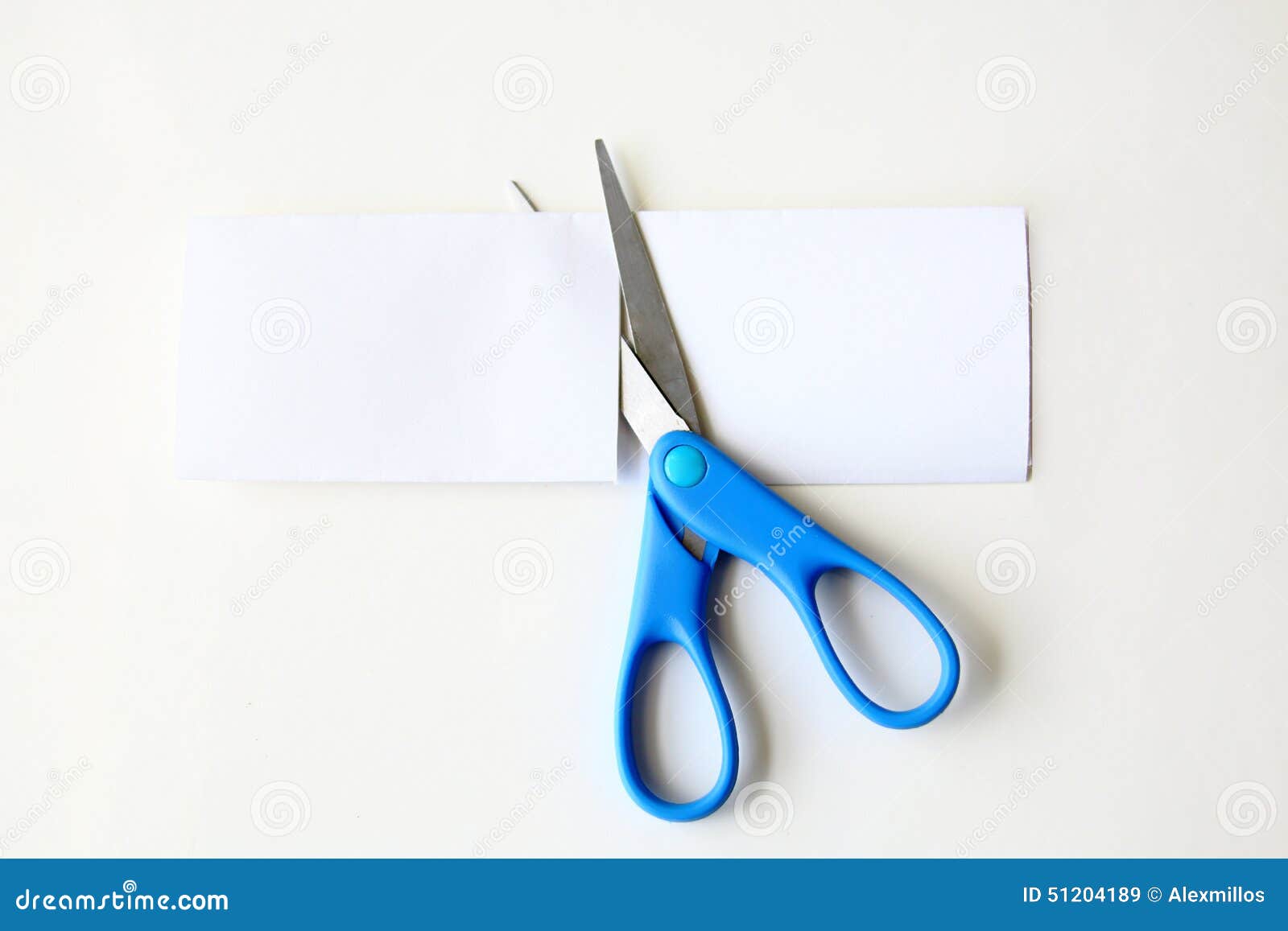 Scissors cutting a paper stock image. Image of scissors - 51204189