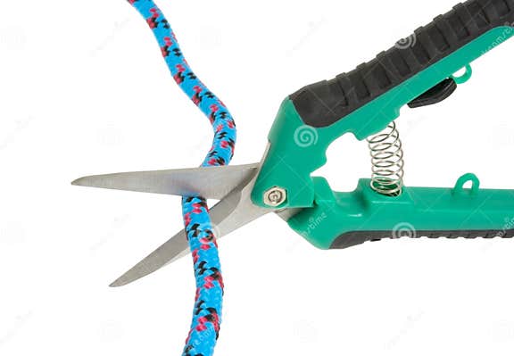 Scissors cutting the rope stock photo. Image of action - 36521932