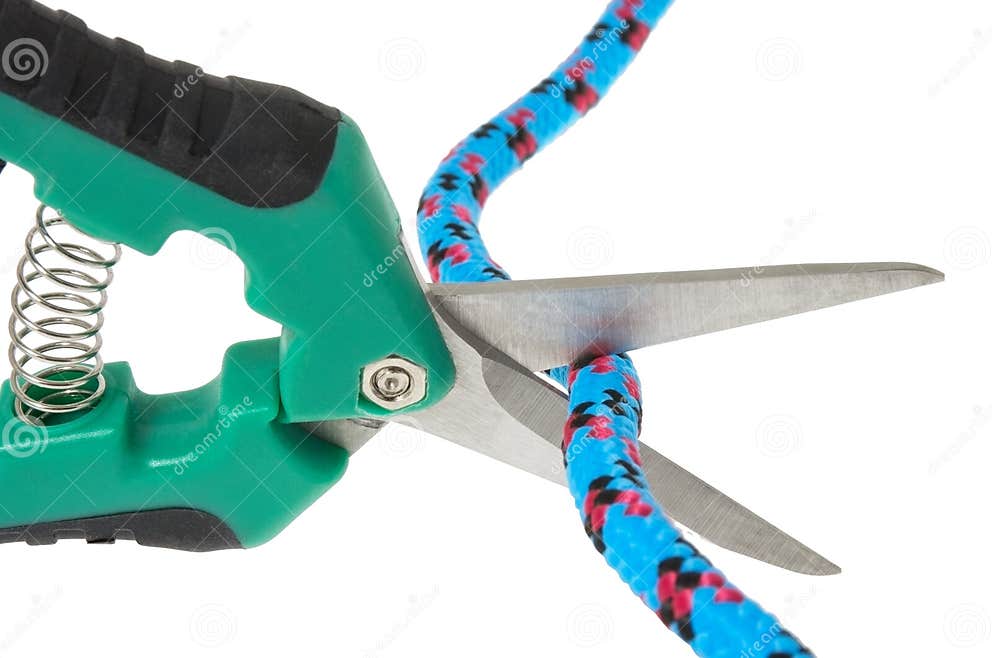 Scissors cutting the rope stock photo. Image of finish - 36617392