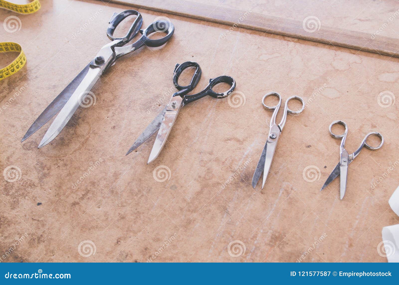 Scissors of Different Sizes on the Table of the Tailor Stock Image ...