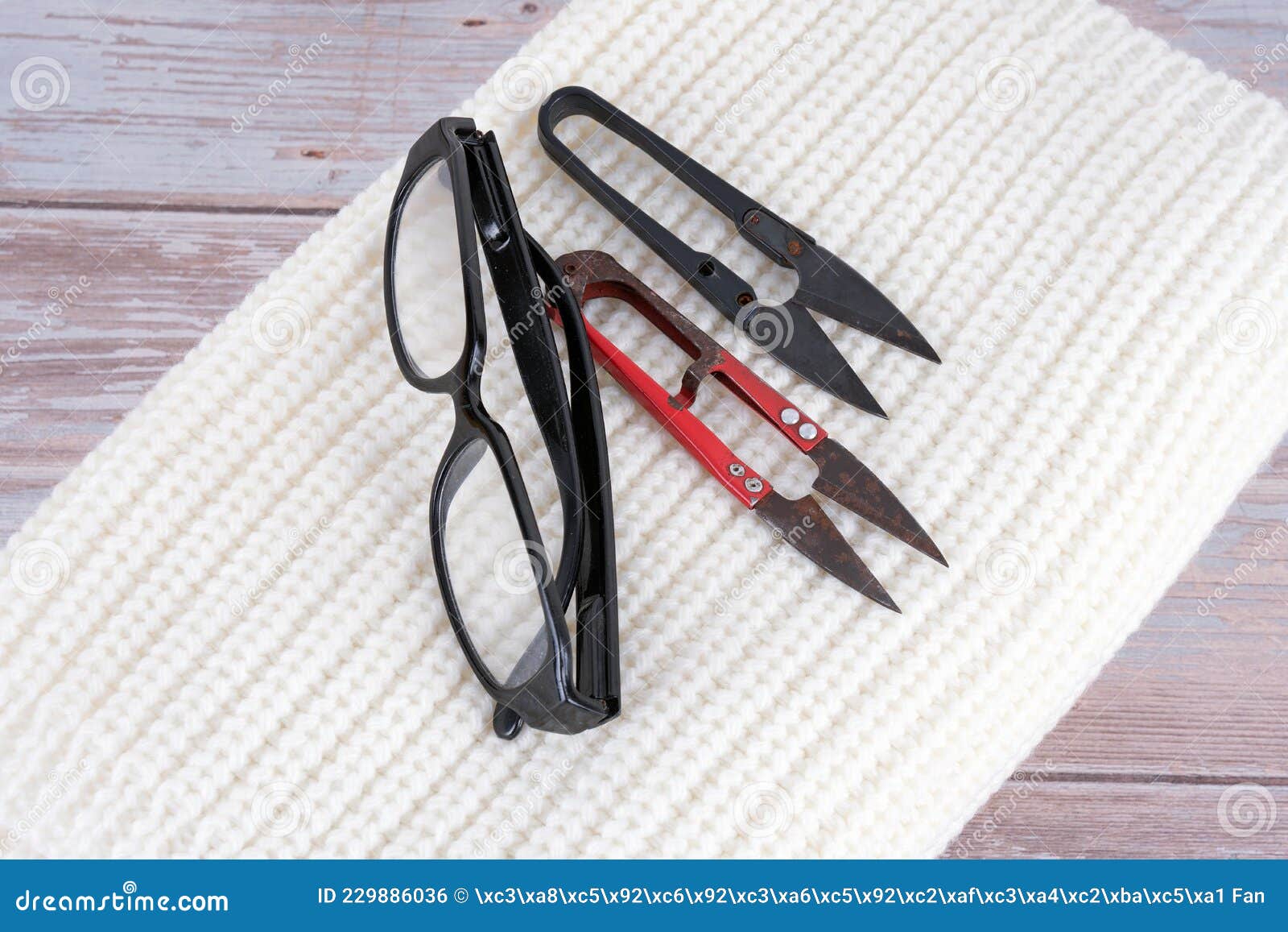 Scissors and Glasses on Woolen Fabric Stock Photo - Image of glasses ...
