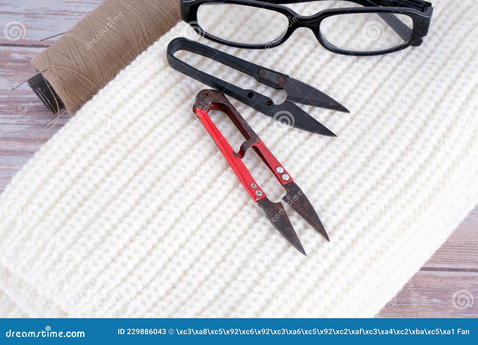 Scissors and Glasses on Woolen Fabric Stock Image - Image of scarf ...
