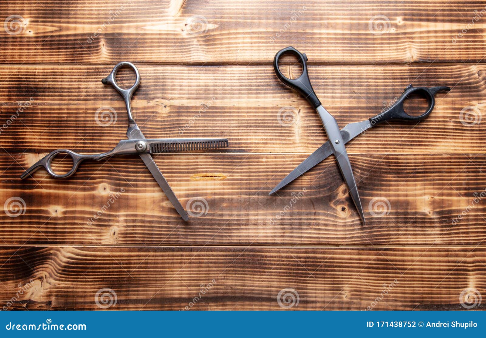 Scissors for Haircuts on a Wooden Background Stock Photo - Image of ...