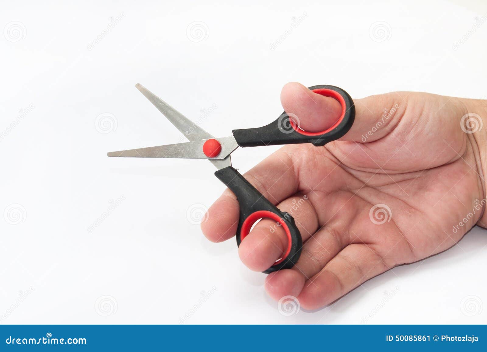 Scissors in the hand stock image. Image of advertise - 50085861