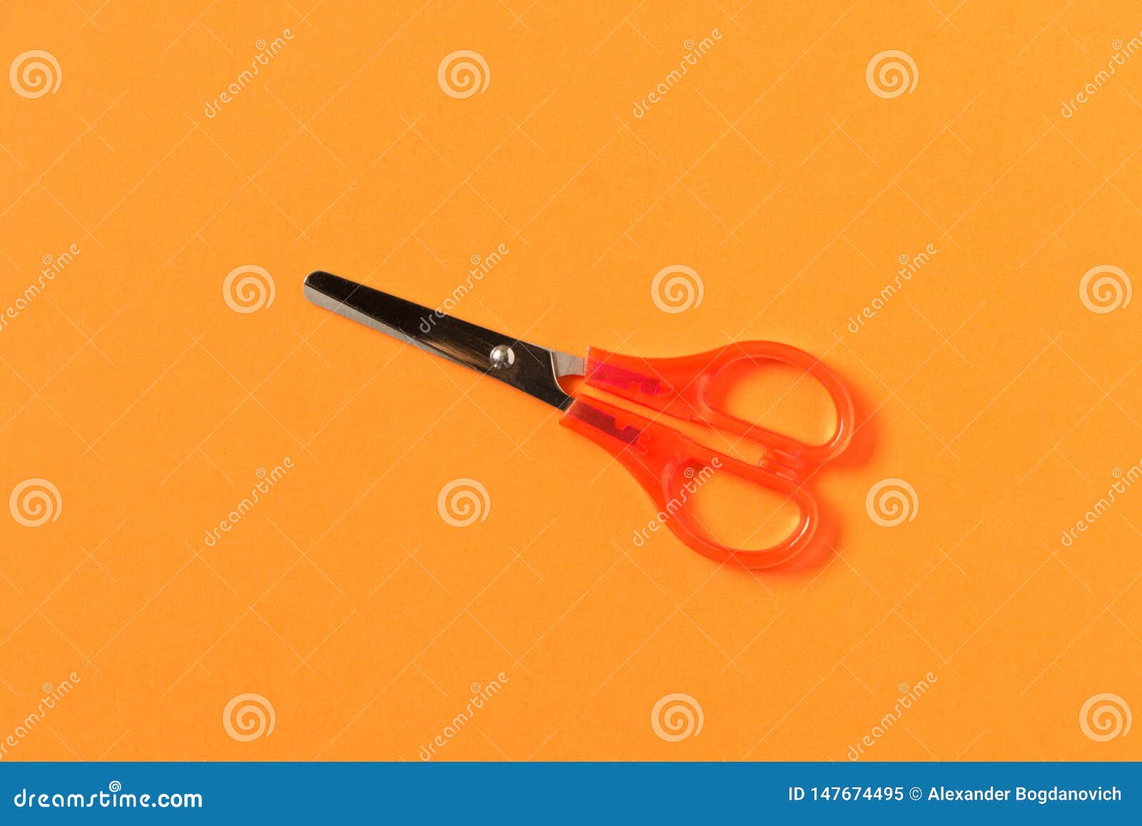 Scissors on an Orange Background. Colored Baby Scissors Stock Image ...