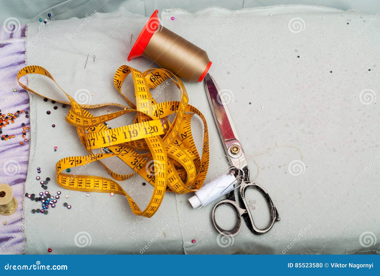 Scissors Reel of Thread, Measuring Tapes and Natural Fabric. Stock ...