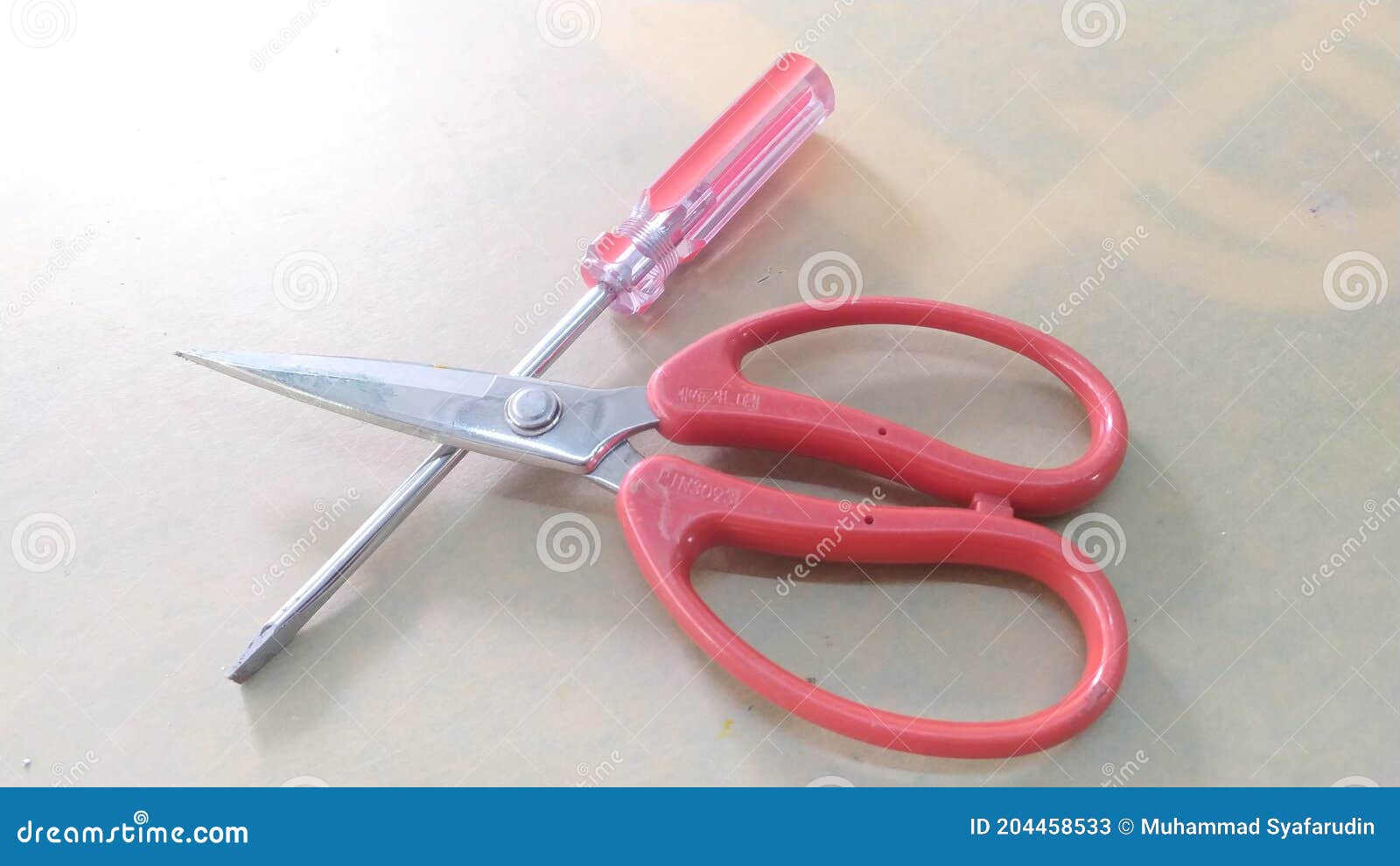 Scissors and screwdriver editorial stock photo. Image of industry ...