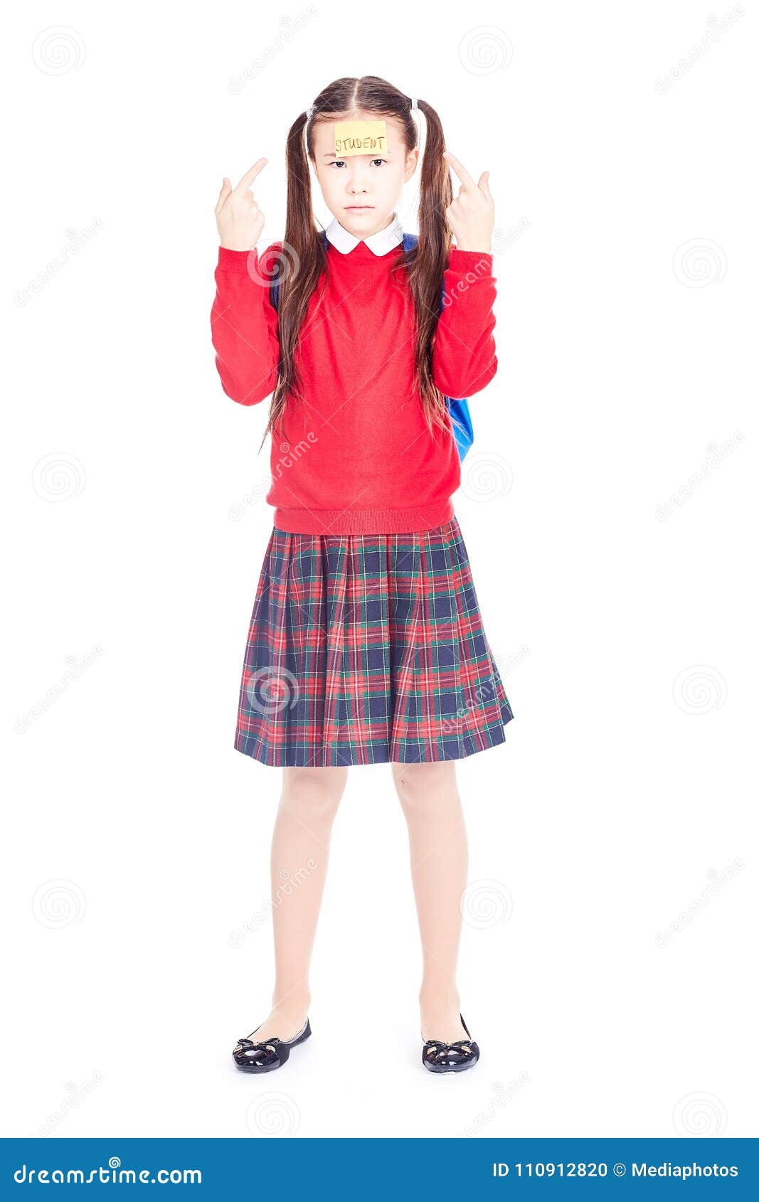 Scolara in uniforme fotografia stock. Immagine di modo - 110912820