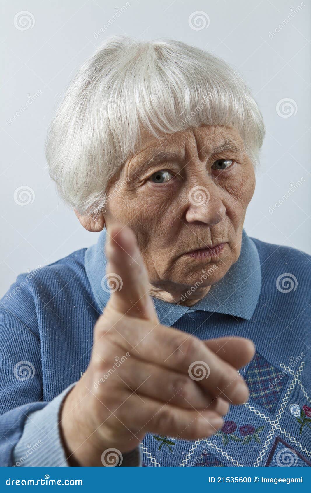 Scolding senior woman stock photo. Image of retired, finger - 21535600