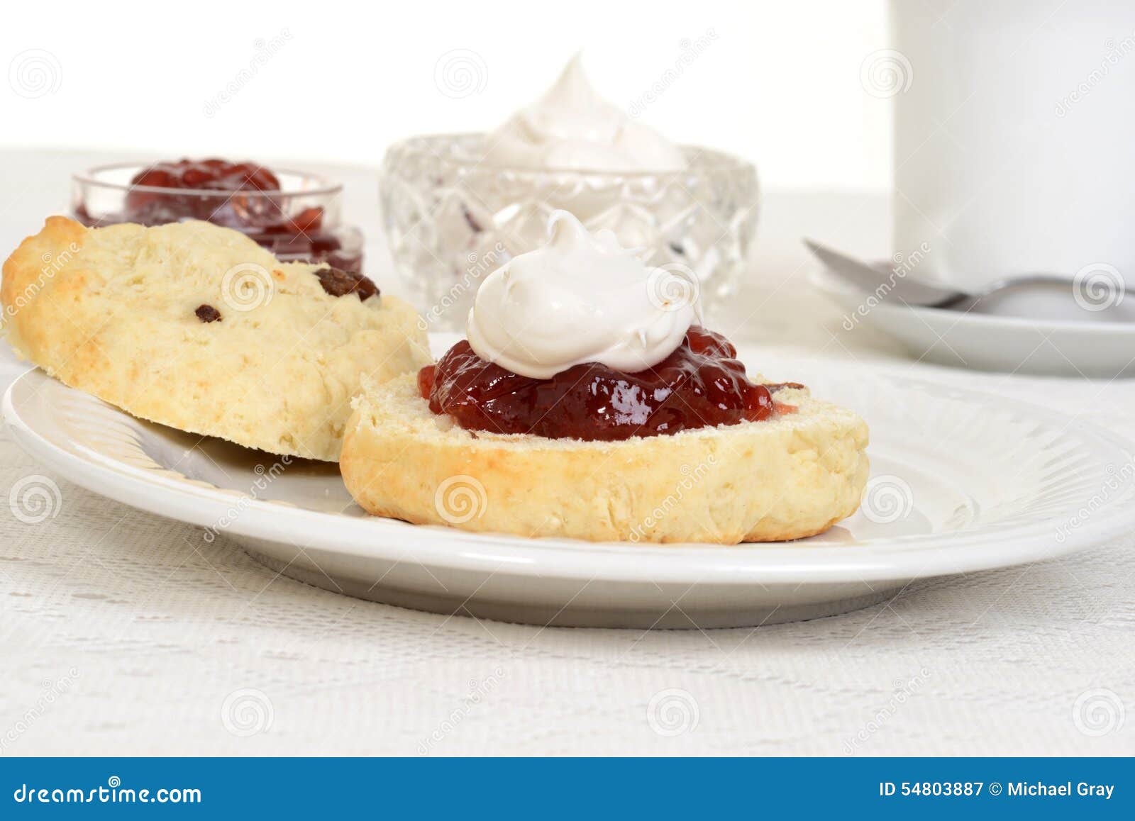 Scone with jam and cream stock image. Image of raspberry - 54803887