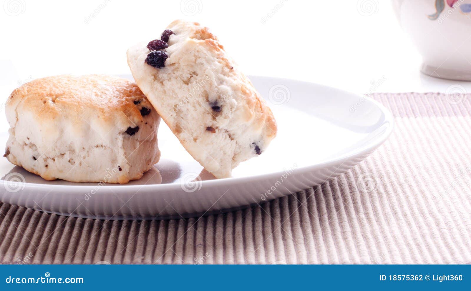 Scones on a plate stock photo. Image of devonshire, pudding - 18575362