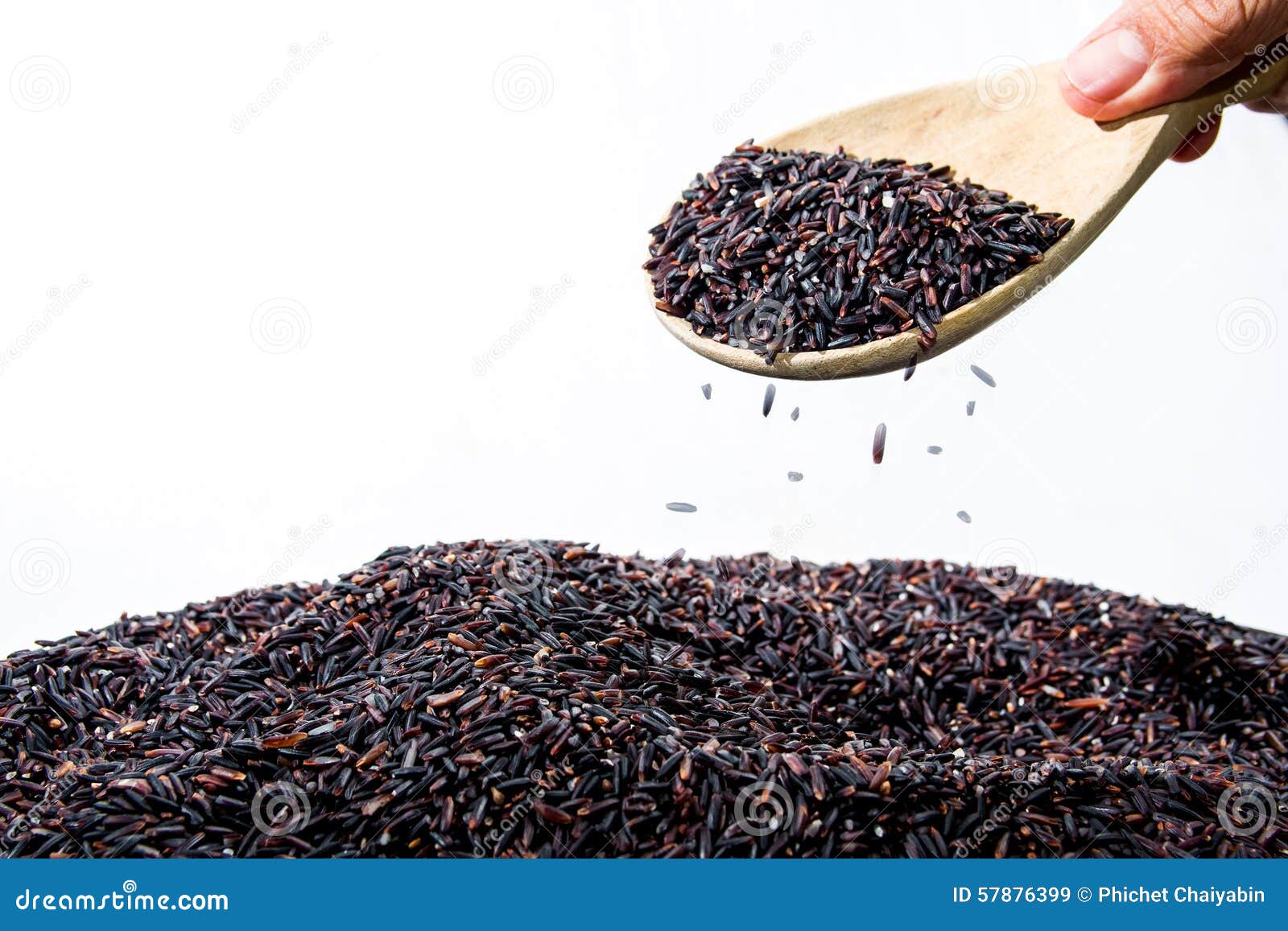 Scooping black rice stock image. Image of table, ingredient - 57876399