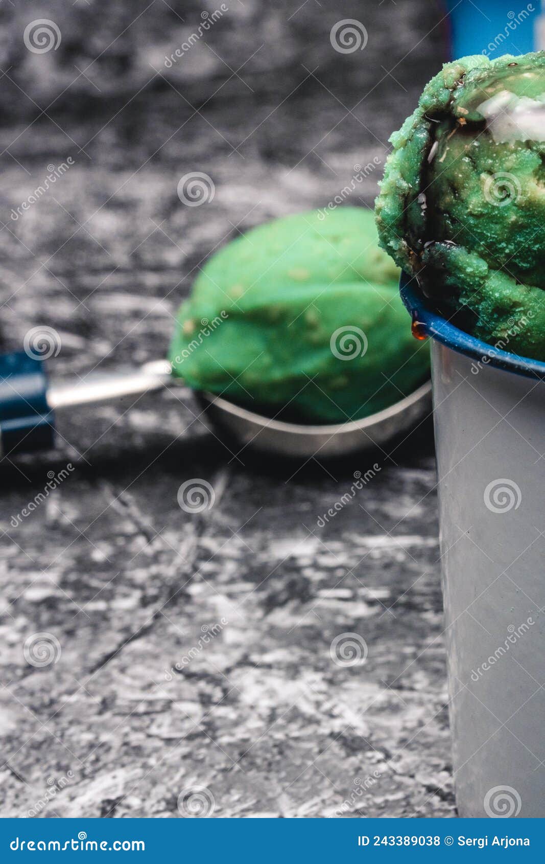 Scoops of Green Ice Cream with an Ice Cream Scoop Stock Photo - Image ...