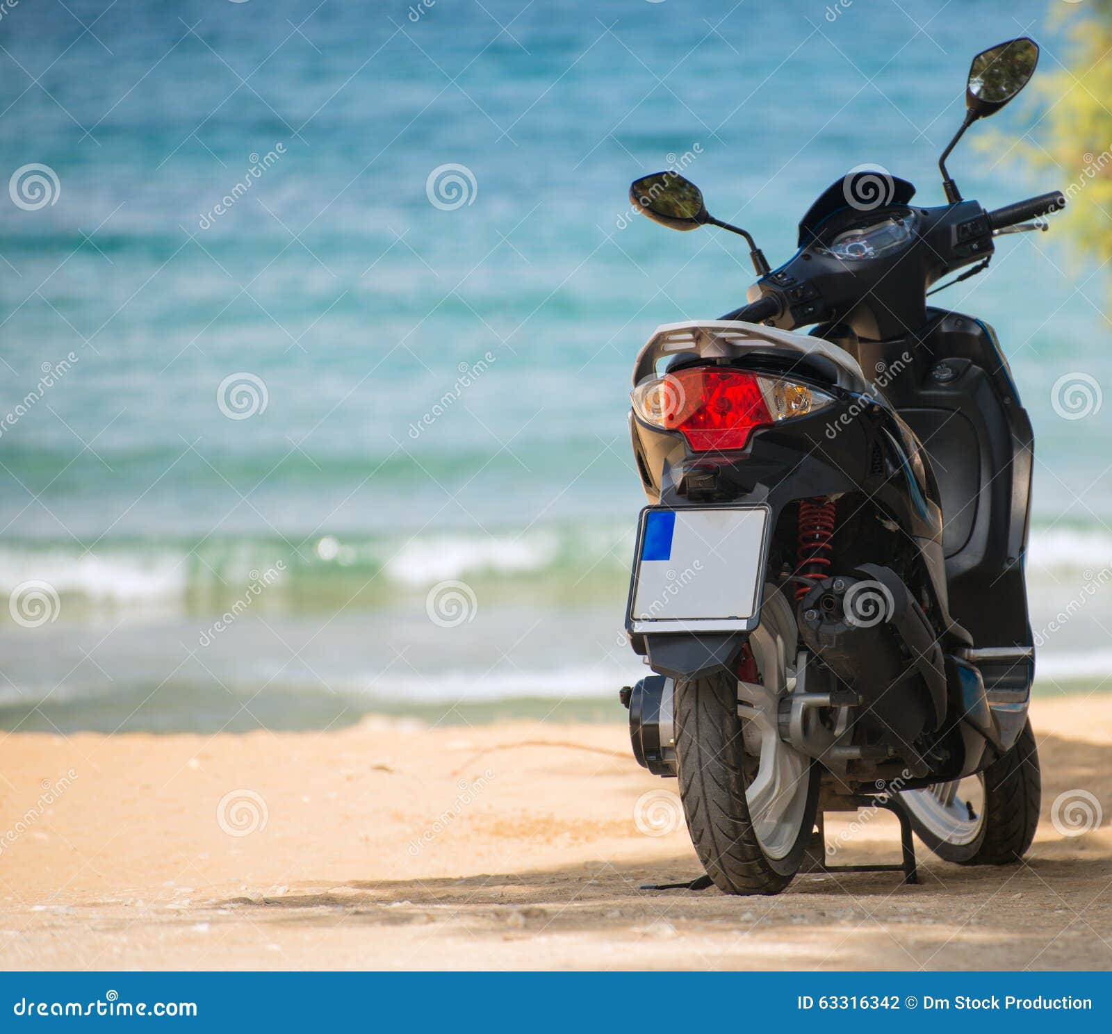 Scooter on the beach. stock photo. Image of journey, coastline - 63316342