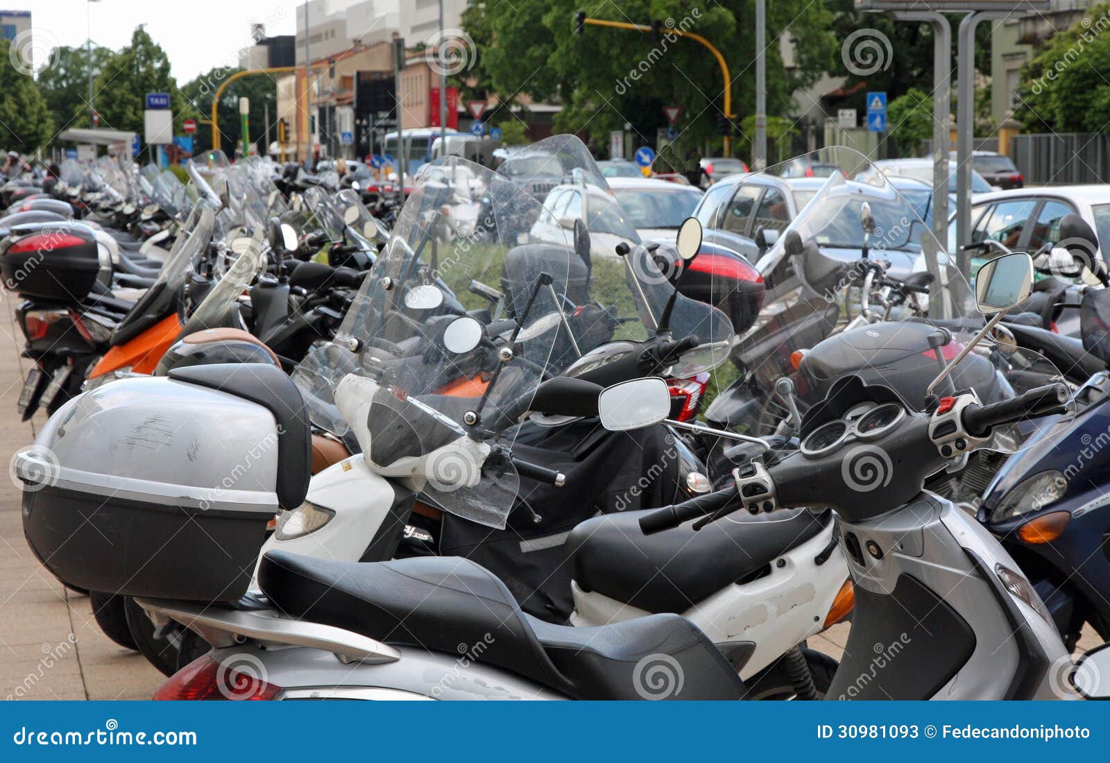Scooters and Motorcycles Parked in Road Car Park Stock Image - Image of ...